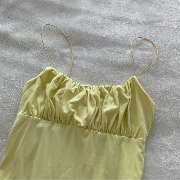 Tops | Pastel Yellow Body Suit | Poshmark